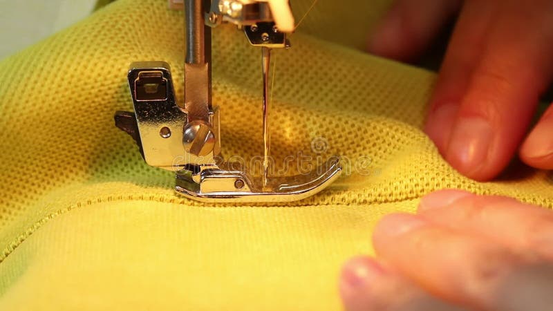 The Process of Sewing Fabric on a Sewing Machine, the Sewing Machine ...