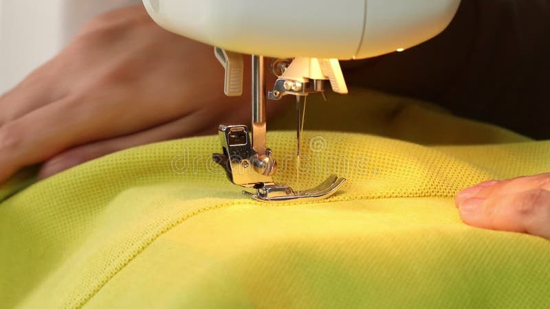 The Process of Sewing Fabric on a Sewing Machine, the Sewing Machine ...