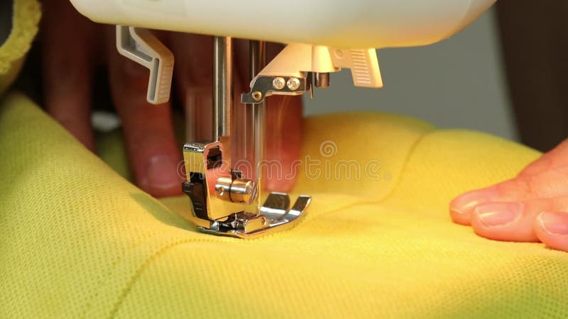 The Process of Sewing Fabric on a Sewing Machine, the Sewing Machine ...