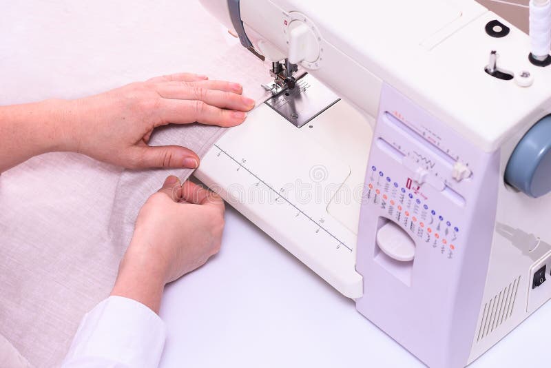 The Process of Sewing on a Sewing Machine. Stock Image - Image of ...