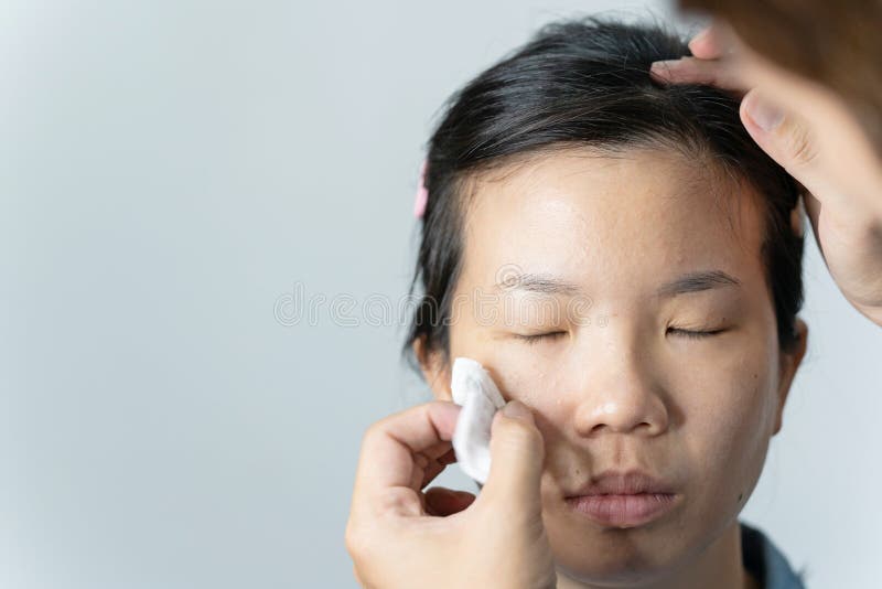 The Process of Shaping Eyebrows by a Beauty Master with a Thread for a ...