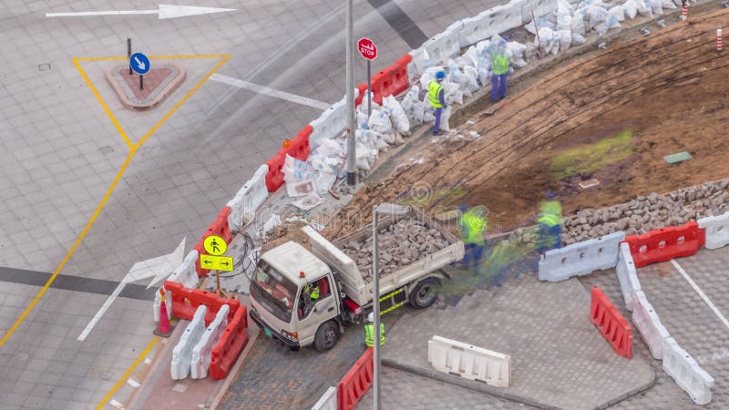 Process of Sidewalk Road Repairing with Many Builder Workers and ...