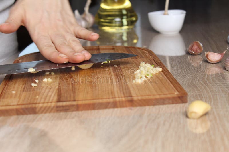 Process Slicing Garlic Girl Cuts Knife Cutting Board Cooking Kitchen ...