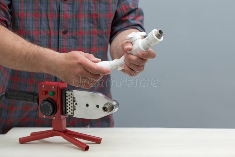 The Process of Soldering Plastic Pipes. Stock Image - Image of plumbing ...