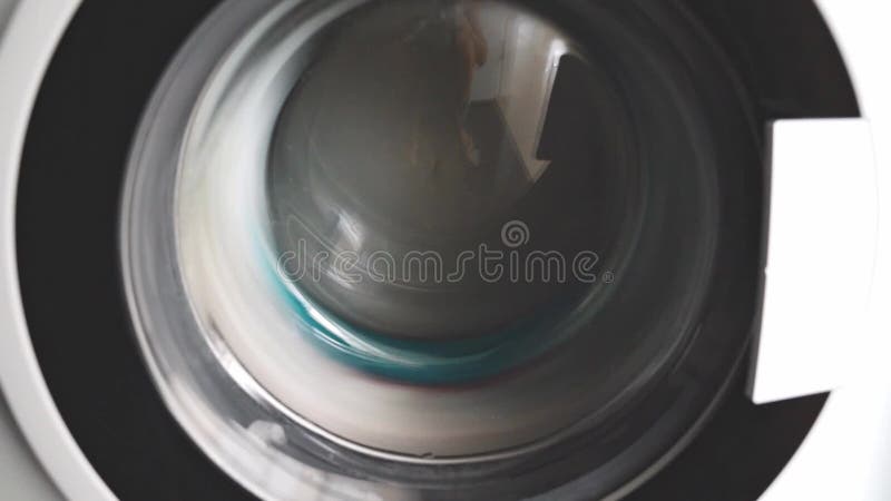 Process of Squeezing Things in Washing Machine, Rapid Rotation of Drum ...