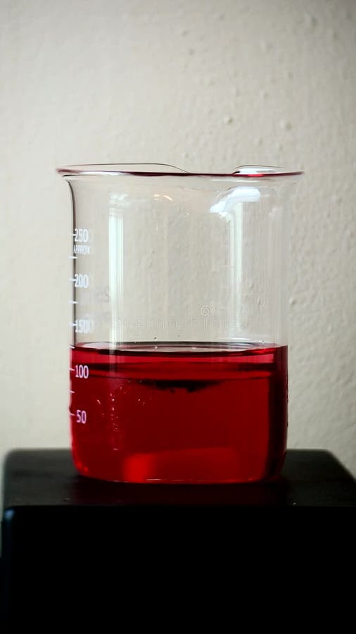 The Process of Stirring Syrup and Water Using a Magnetic Stirrer Stock ...