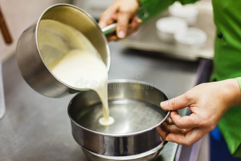 The Process of Straining when Preparing the Brule Cream Stock Photo ...