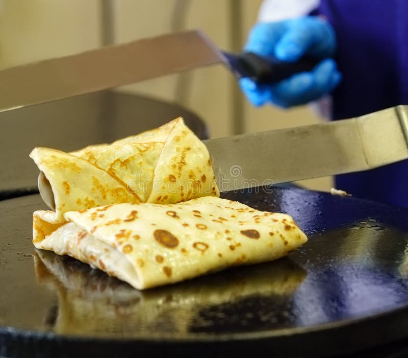 Process of Stuffed Pancake Frying in Cafe Kitchen Stock Photo - Image ...