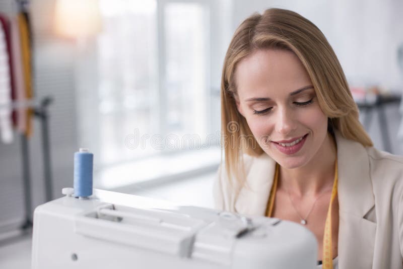 Pensive Female Tailor Sewing Material Stock Photo - Image of ...