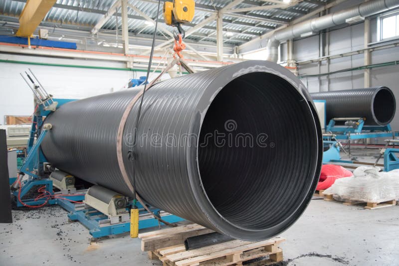 The Process of Threading a Large Plastic Pipe. Factory for the ...