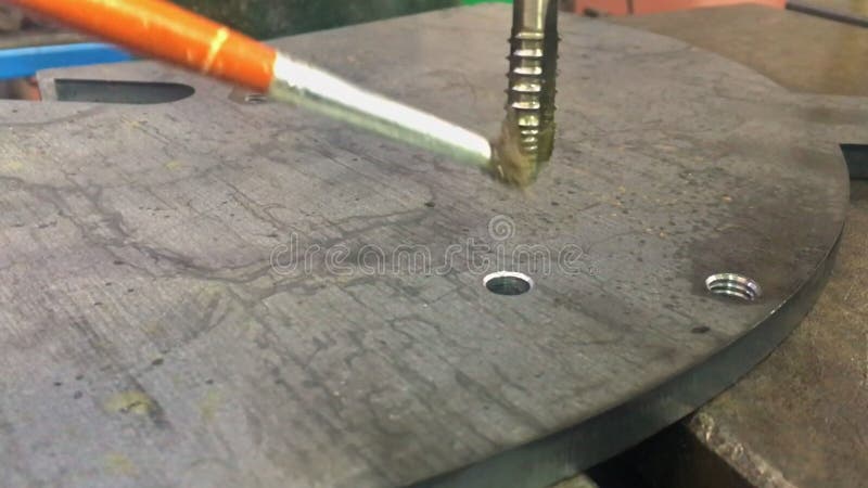 The Process of Threading in Metal on a Drilling Machine. Stock Video ...