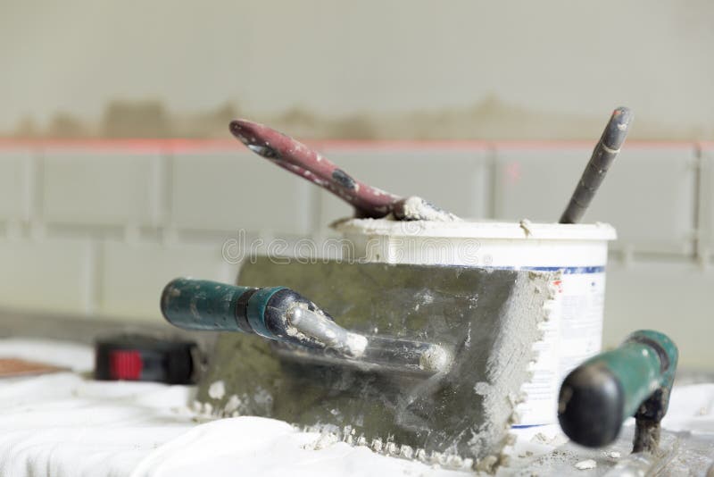 Process of Tiling the Tiles in the Kitchen with Necessary Tiling Stock ...