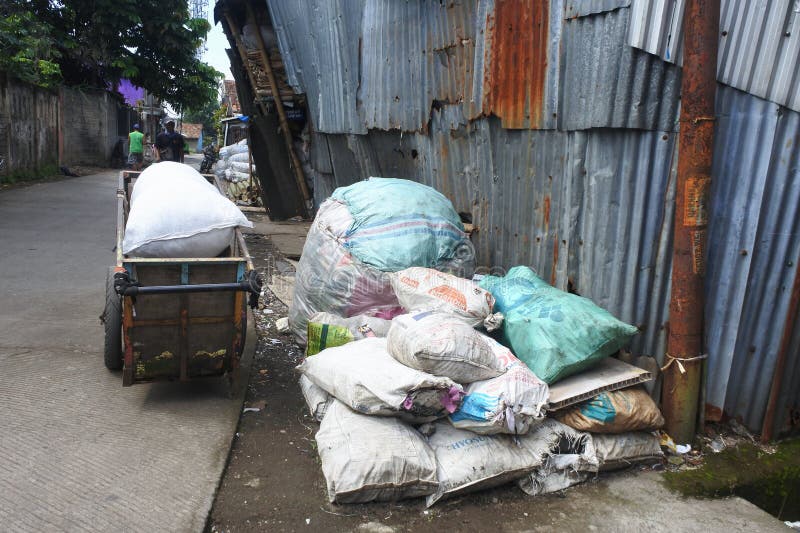 The Process of Transporting Waste that Has Been Sorted and Wrapped in ...