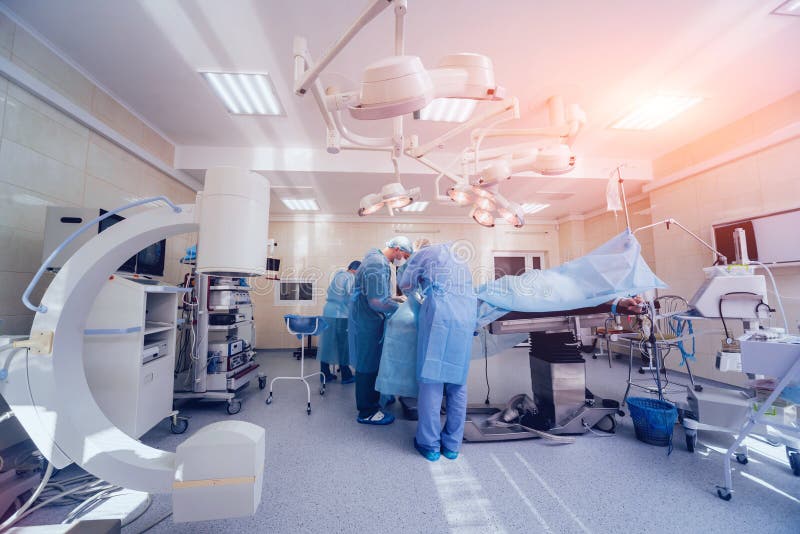 Process of Trauma Surgery Operation. Group of Surgeons in Operating ...