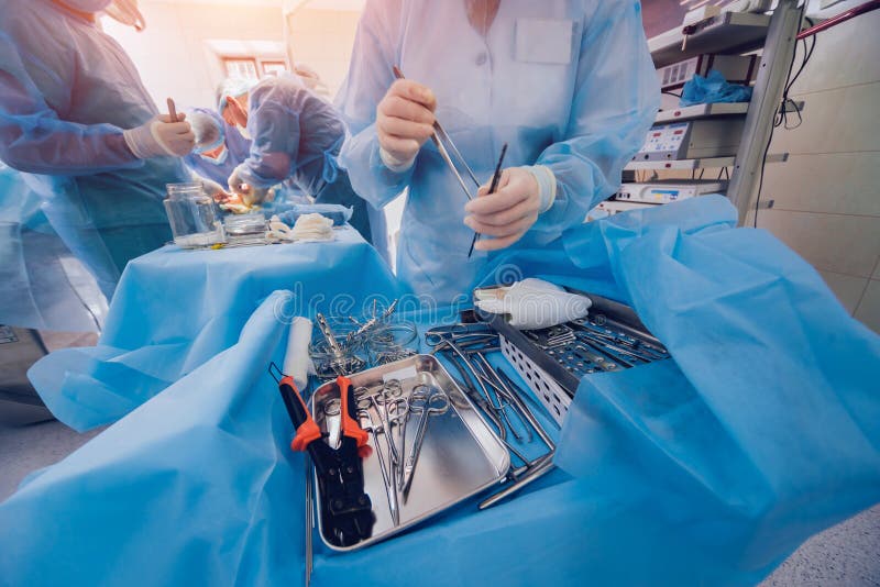 Process of Trauma Surgery Operation. Group of Surgeons in Operating ...