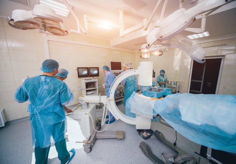 Process of Trauma Surgery Operation. Group of Surgeons in Operating ...