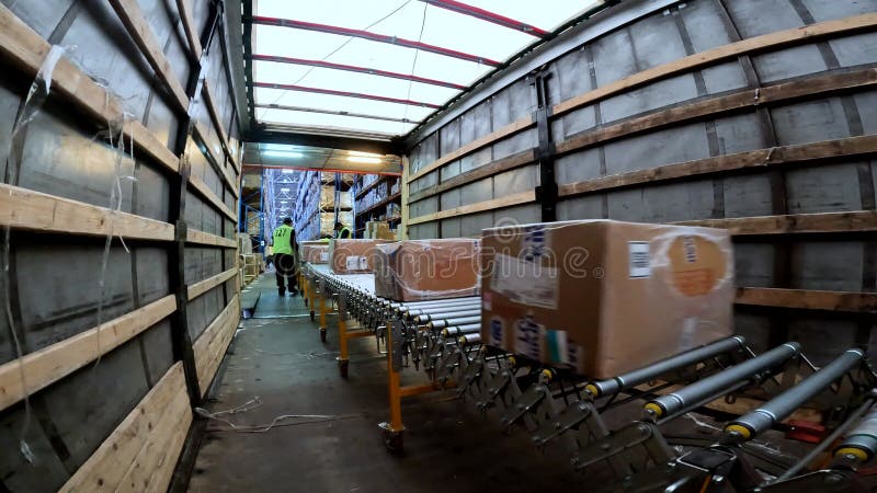 Goods are Unloaded from the Truck. the Process of Unloading Goods from ...