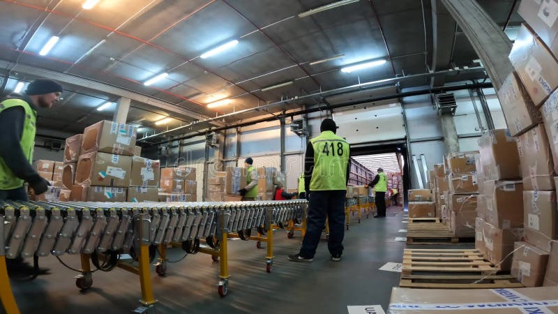 The Process of Unloading Goods from a Truck. Goods are Unloaded from ...