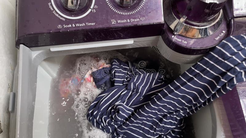 The Process of Washing Clothes in a Washing Machine Stock Video - Video ...