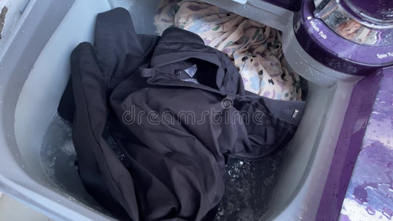 The Process of Washing Clothes in a Washing Machine Stock Video - Video ...