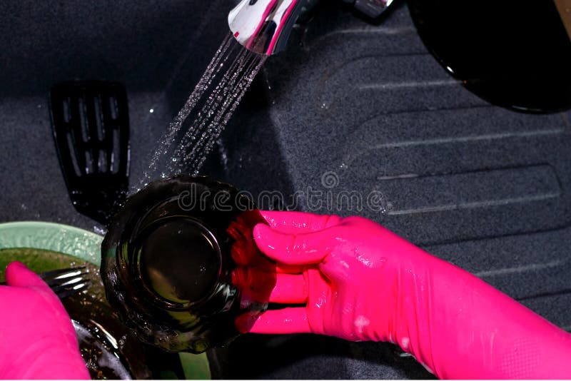 The Process of Washing Plates in the Sink, Hands and Plates Closeup ...
