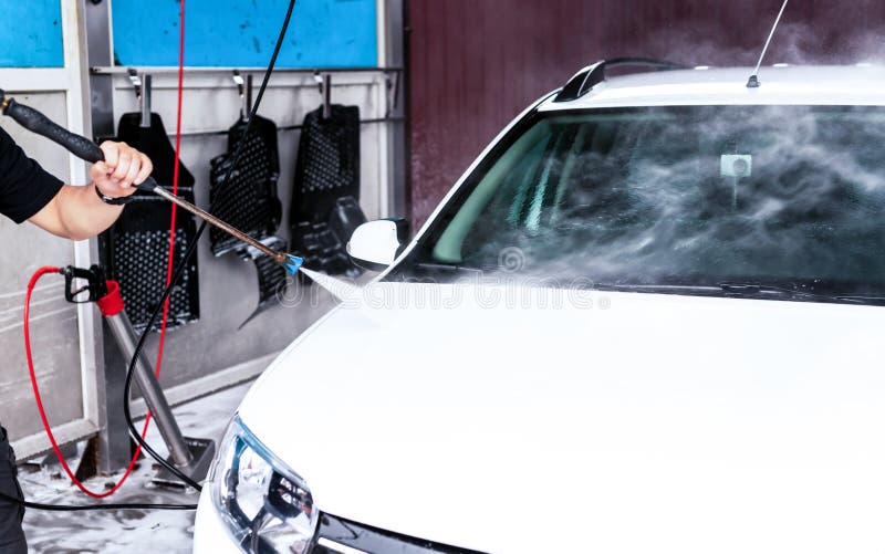 The Process of Washing a White Car Using a Pressure Washer Stock Image ...