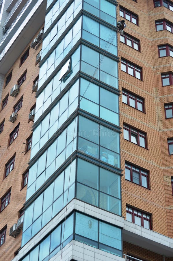 Skyscraper window cleaning stock image. Image of person - 254996367