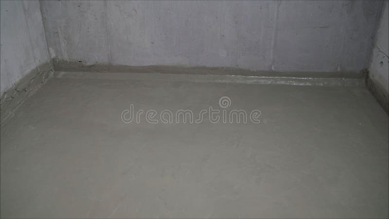 The Process of Waterproofing the Floor with a Solution. the Master ...