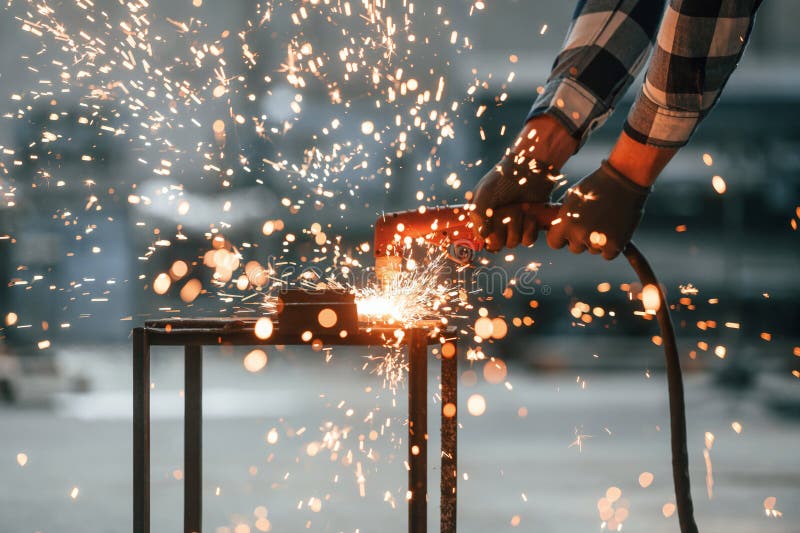 Process of Welding. Factory Male Worker in Uniform is Indoors Stock ...
