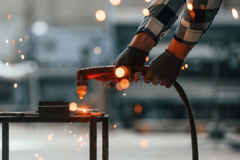 Process of Welding. Factory Male Worker in Uniform is Indoors Stock ...