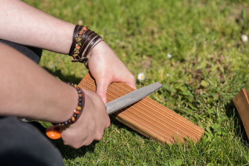 Process wood with rasp stock photo. Image of hand, grate - 174338466