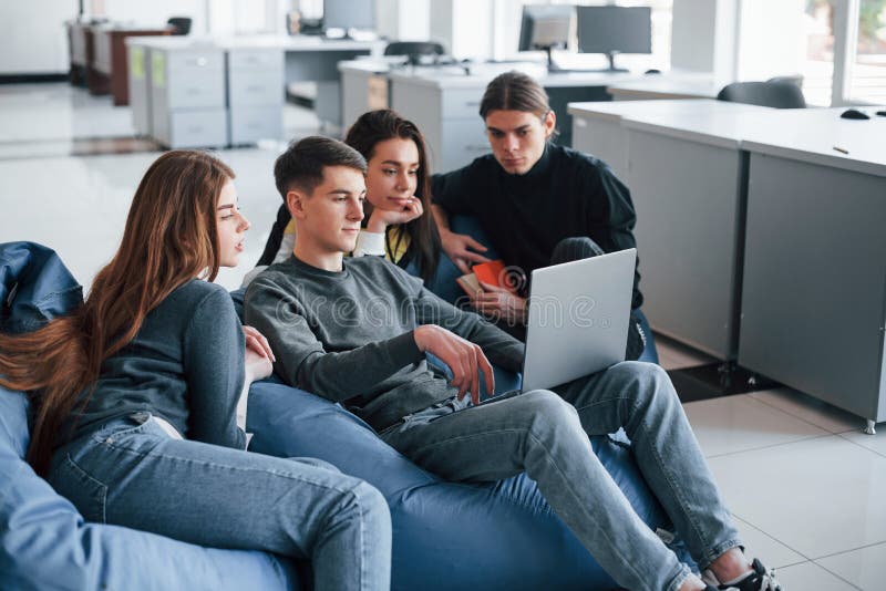 Process of Work. Group of Young People in Casual Clothes in the Modern ...