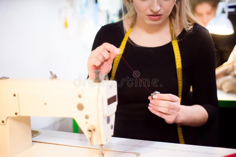 Process of Working with Sewing Machine in an Atelier. Stock Photo ...