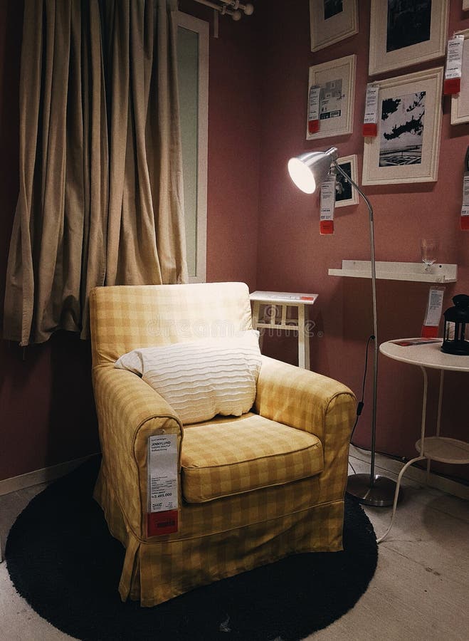 Empty Chair with Yellow Checkerboard Pattern in Cozy Room Stock Photo ...