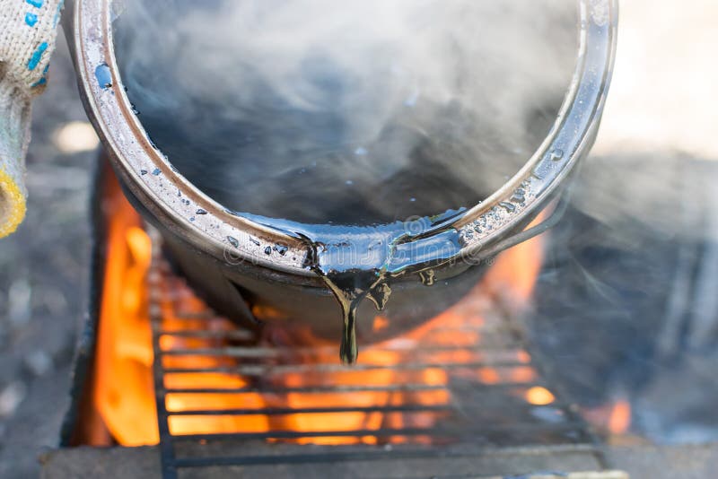Processing Black Oil with Steam on Fire in Metal Stock Photo - Image of ...