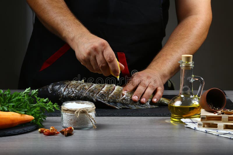 Processing of Cooking Fish with Lemon Juice. Carp Fish with Various ...