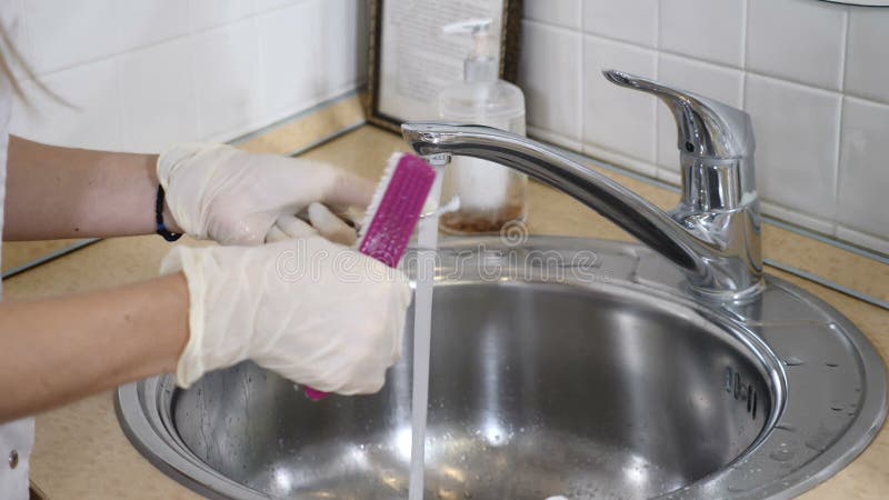 Processing, Disinfection of Medical Tools Under Running Water in Beauty ...