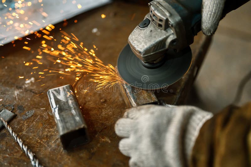 Processing and Grinding of a Metal Part Using an Angle Grinder. Stock ...