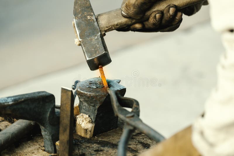 Processing Hot Metal on an Anvil, the Work of the Past, the Tools of ...