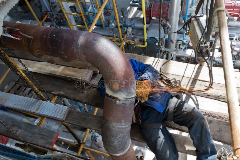 Processing Root Weld with a Cutting Machine . Sparks Fly in Diff ...