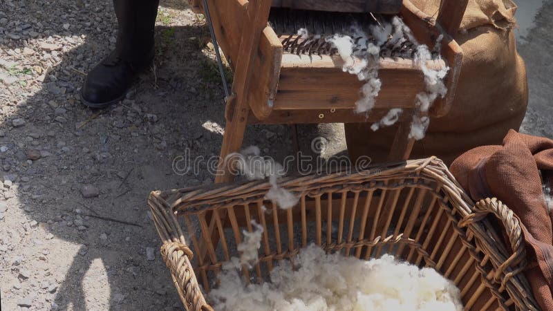 Processing Sheep Wool on an Old Wooden Machine Stock Footage - Video of ...
