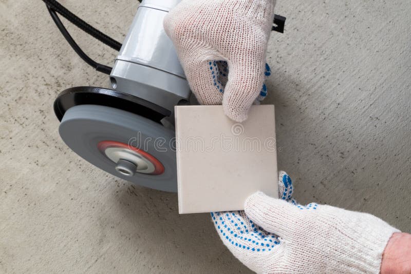 Processing Tile or Porcelain Tiles with a Grinder. Stock Image - Image ...