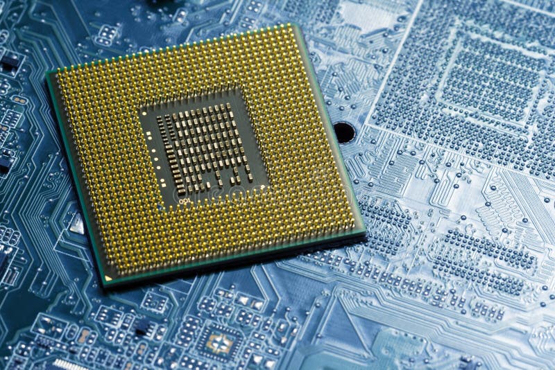 Processor on Blue Circuit Board with Gold-plated Contacts Close Up ...