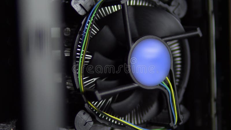 The Processor Cooler on the Motherboard is Spinning Closeup. CPU ...