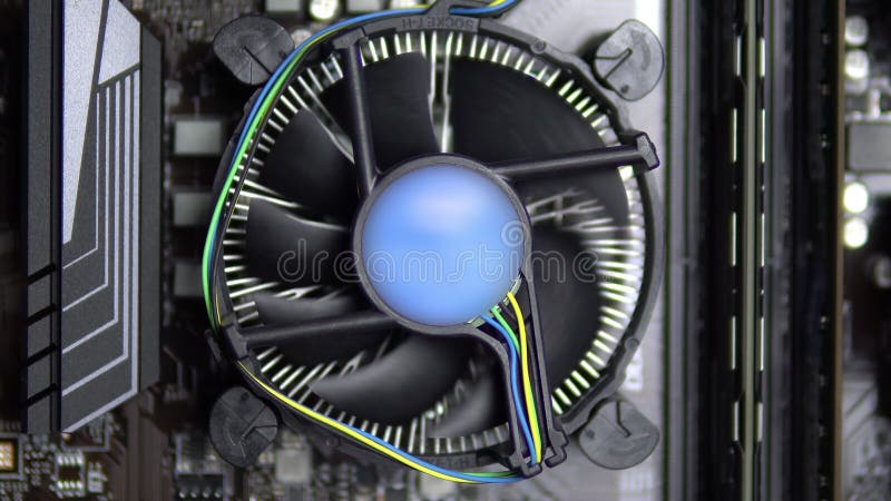 The Processor Cooler on the Motherboard is Spinning Closeup. CPU ...