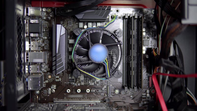 The Processor Cooler on the Motherboard is Spinning Closeup. CPU ...