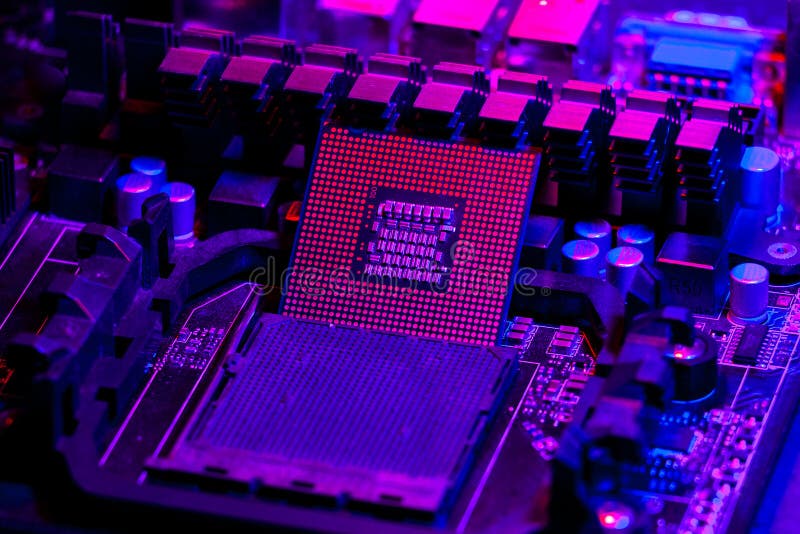 The Processor on the Motherboard in Neon Light. Computer Parts Stock ...