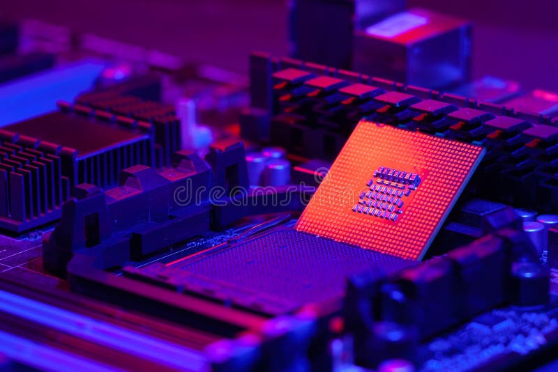 The Processor on the Motherboard in Neon Light. Computer Parts. Close ...