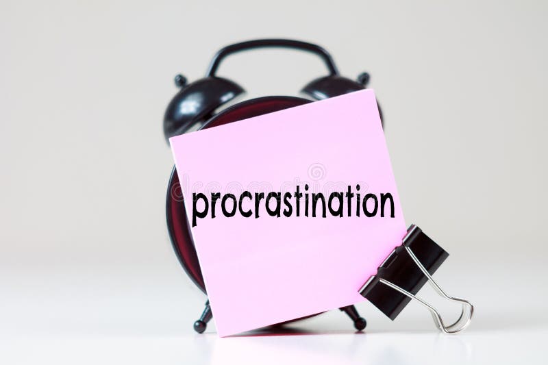 Procrastination Text on a Sticker for Reminders with an Alarm Clock ...