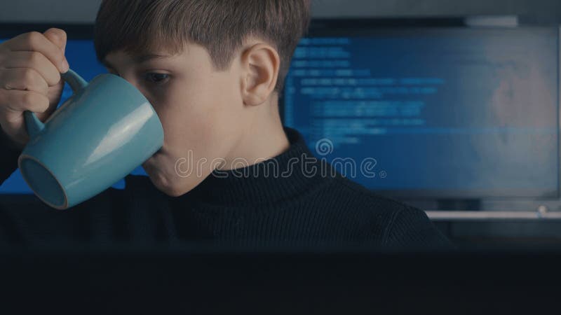 Prodigy Boy Hacker Programmer Working on Computer in Secret Data Center ...